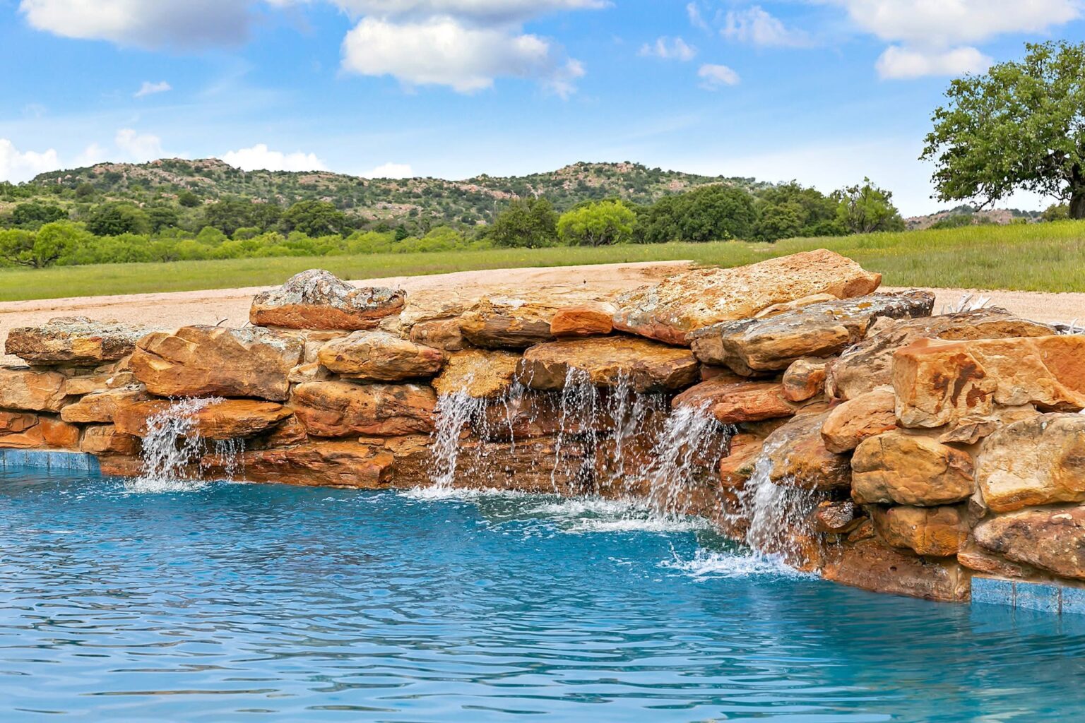 Natural Landscaping Boulders in Georgetown, Pflugerville, & Round Rock